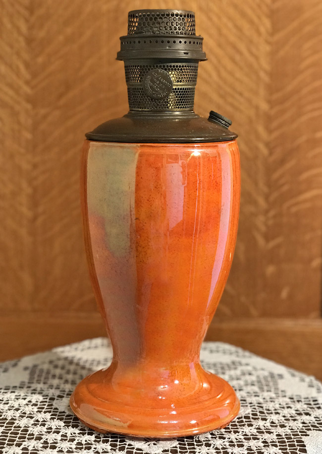 An original 10 1/4 inch lustre orange crown devon vase style aladdin lamp